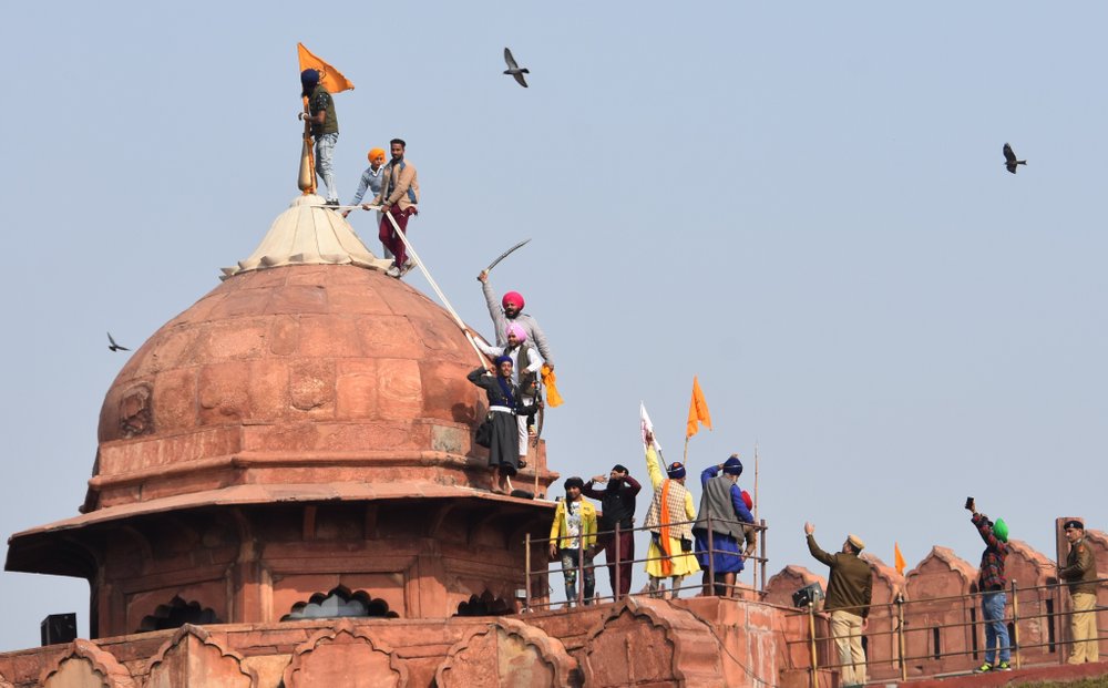 Angry farmers storm India’s Red Fort in huge tractor rally – THE OPEN VIEW